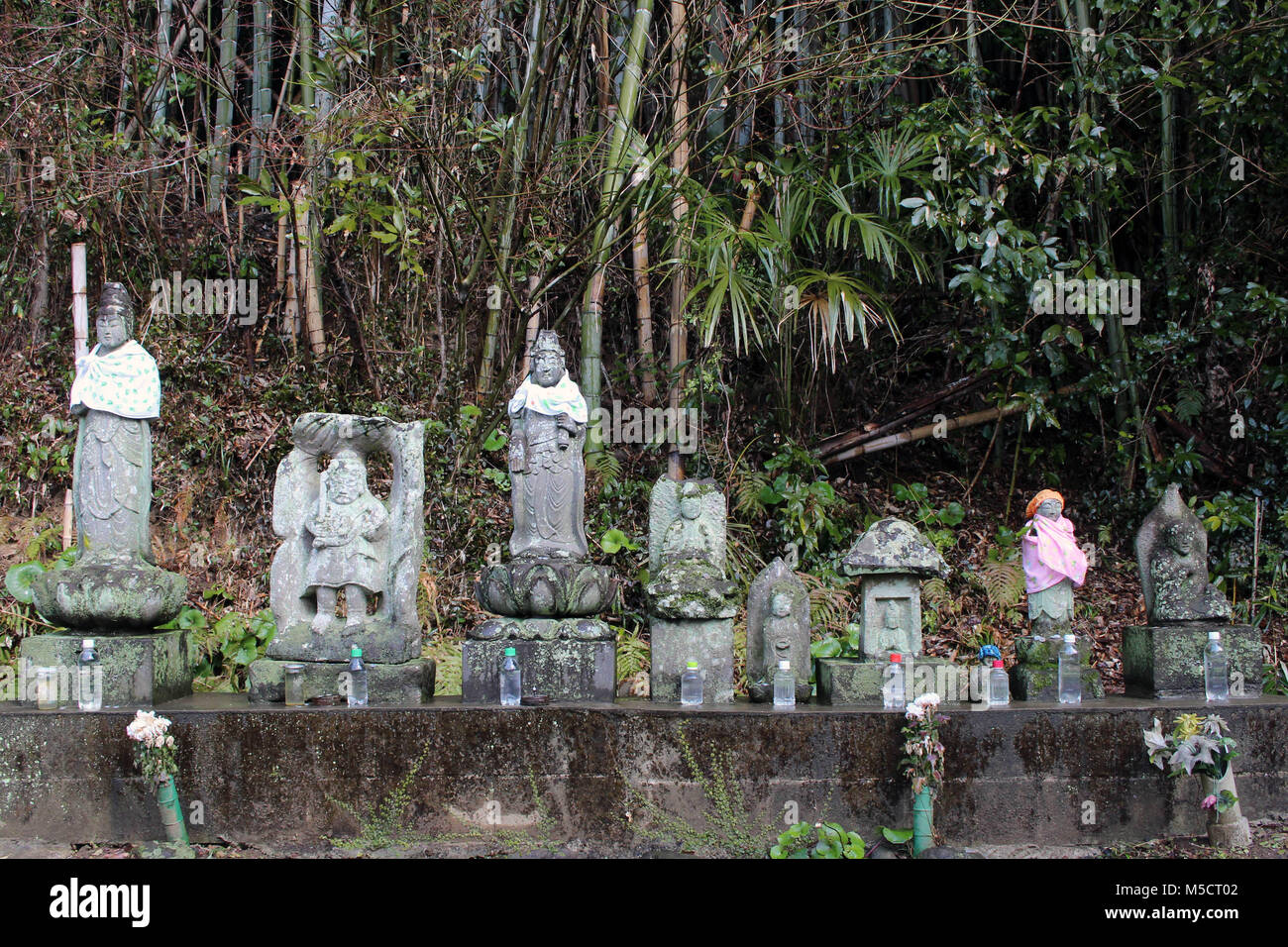 Some statues are dressed at the temple around Hizen-Yamaguchi station ...