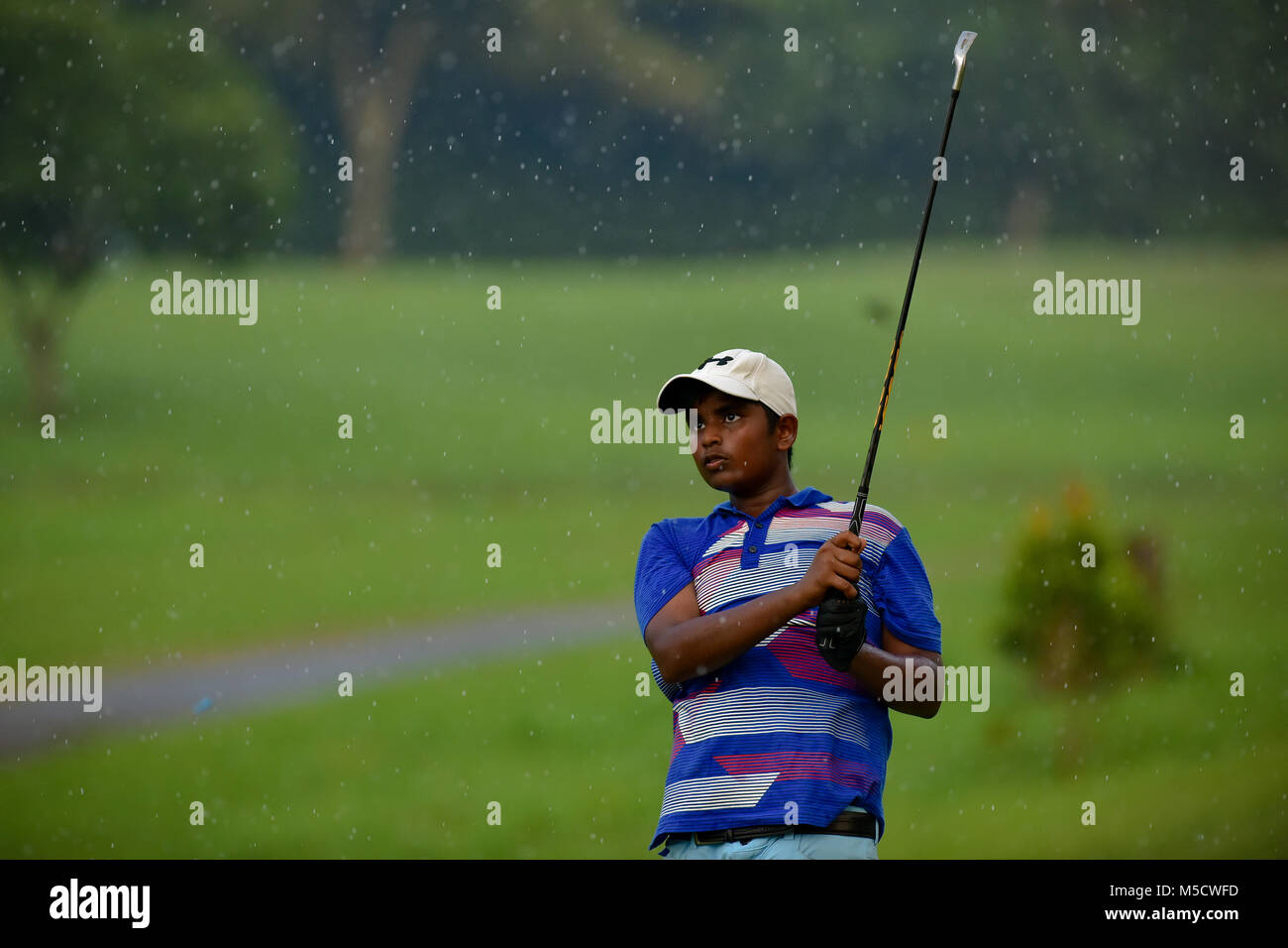 Danau, UKM Bangi - FEBRUARY 10: Dylan Alvin Augustine watches his tee ...