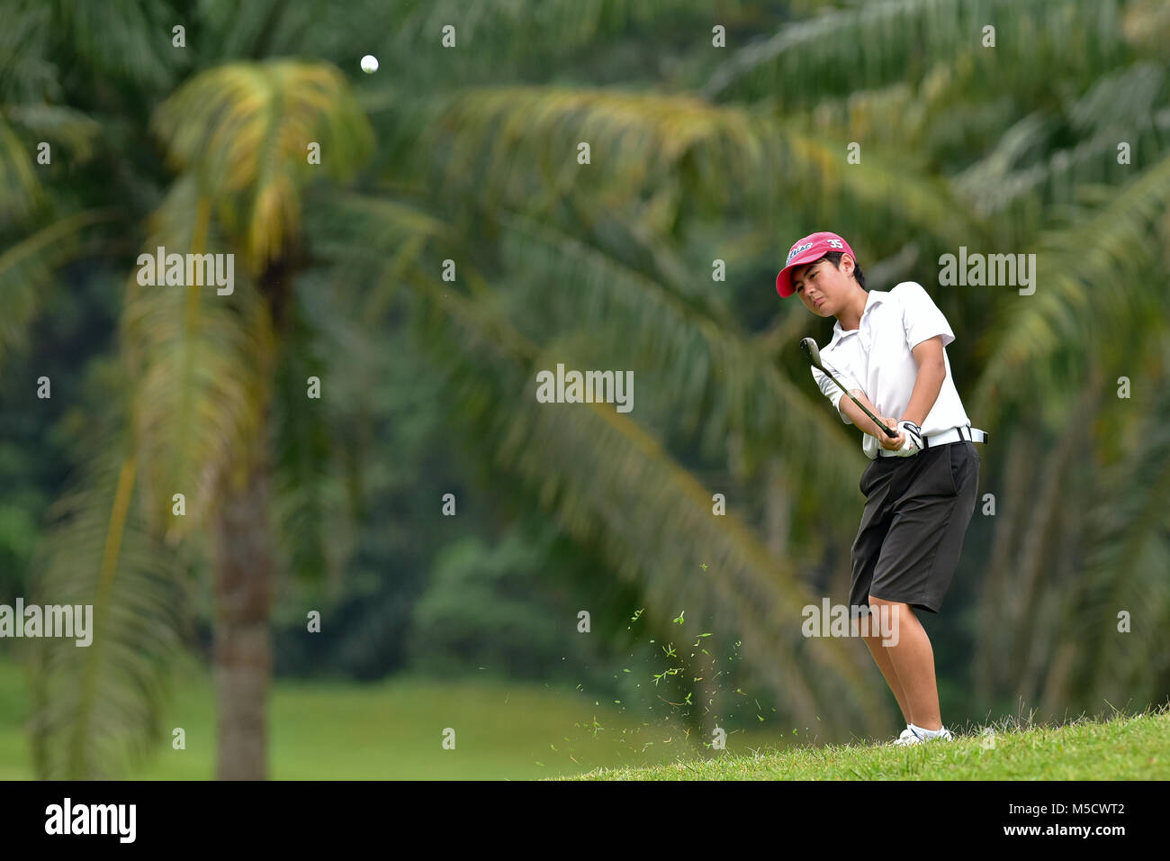 Danau, UKM Bangi - FEBRUARY 10: Jake Foley plays his shot on the 6th ...