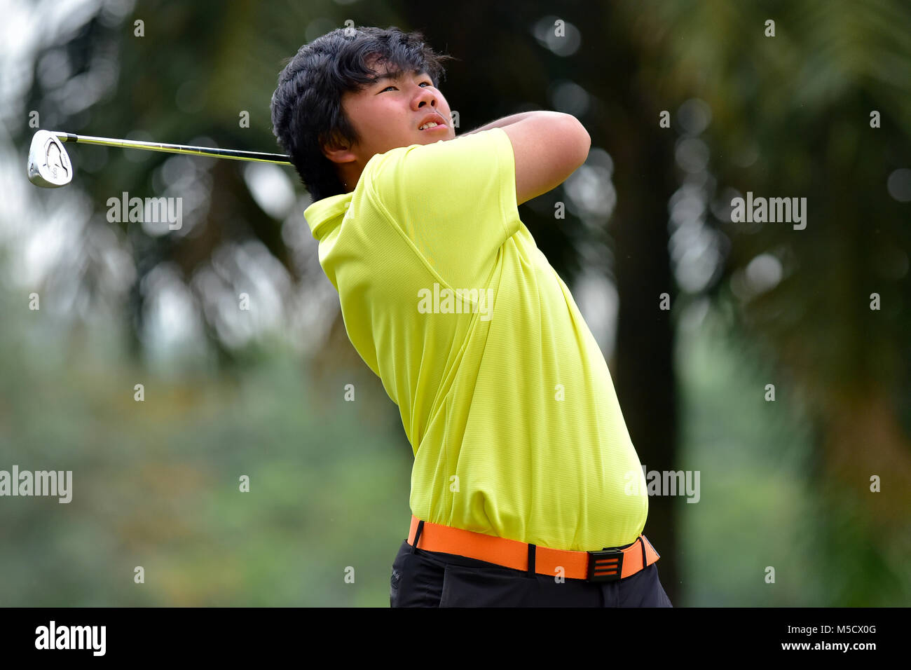 Danau, UKM Bangi - FEBRUARY 10: Ryan Wei Jian takes his tee shot on the ...