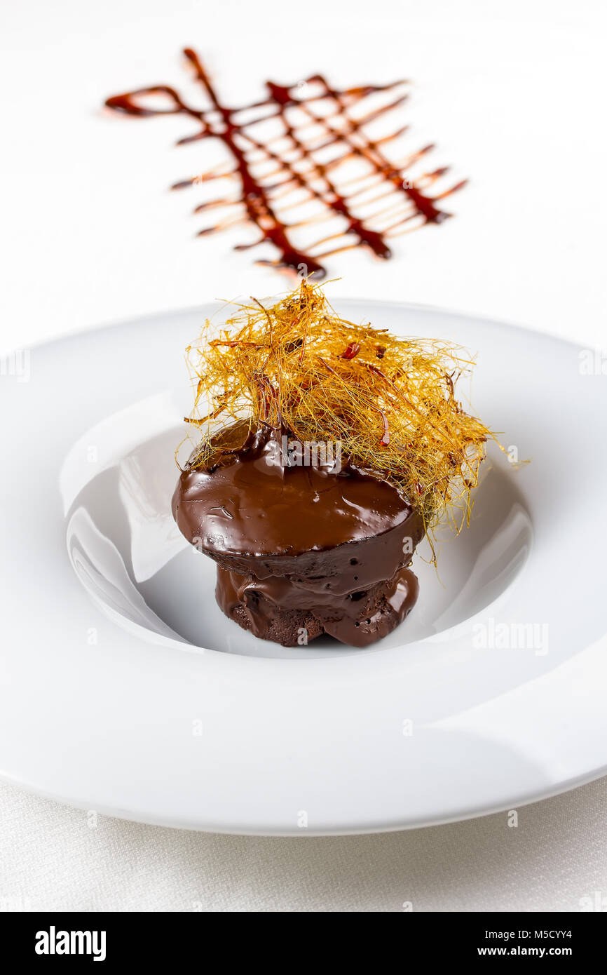 chocolate cake with caramel threads Stock Photo - Alamy