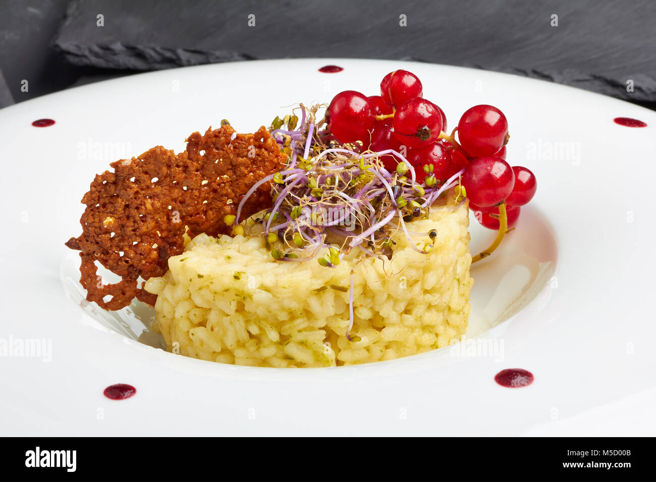 Vegetable risotto and crispy cheese Stock Photo - Alamy