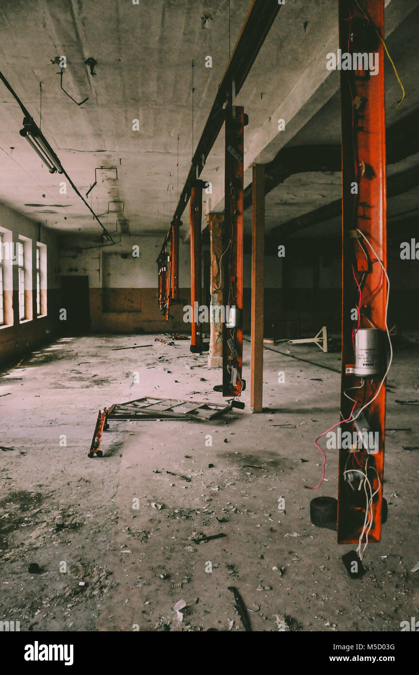 An abandoned factory. Damaged equipment Stock Photo - Alamy