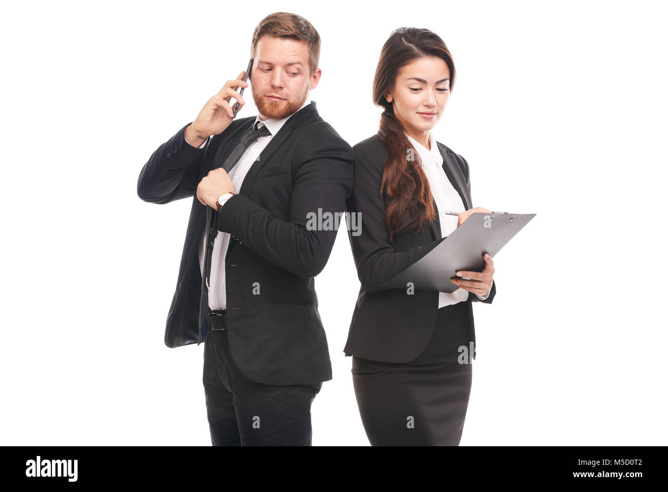 Asian woman talking male colleague Cut Out Stock Images & Pictures - Alamy