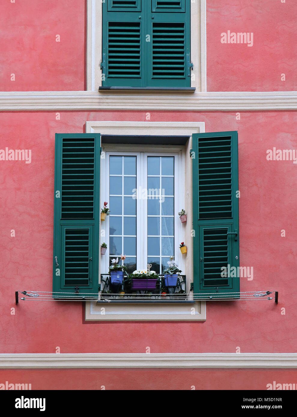 Retro style window exterior on pink facade with open blinds Stock Photo ...