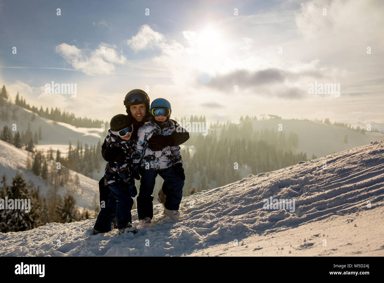 Father sons skiing hi-res stock photography and images - Alamy