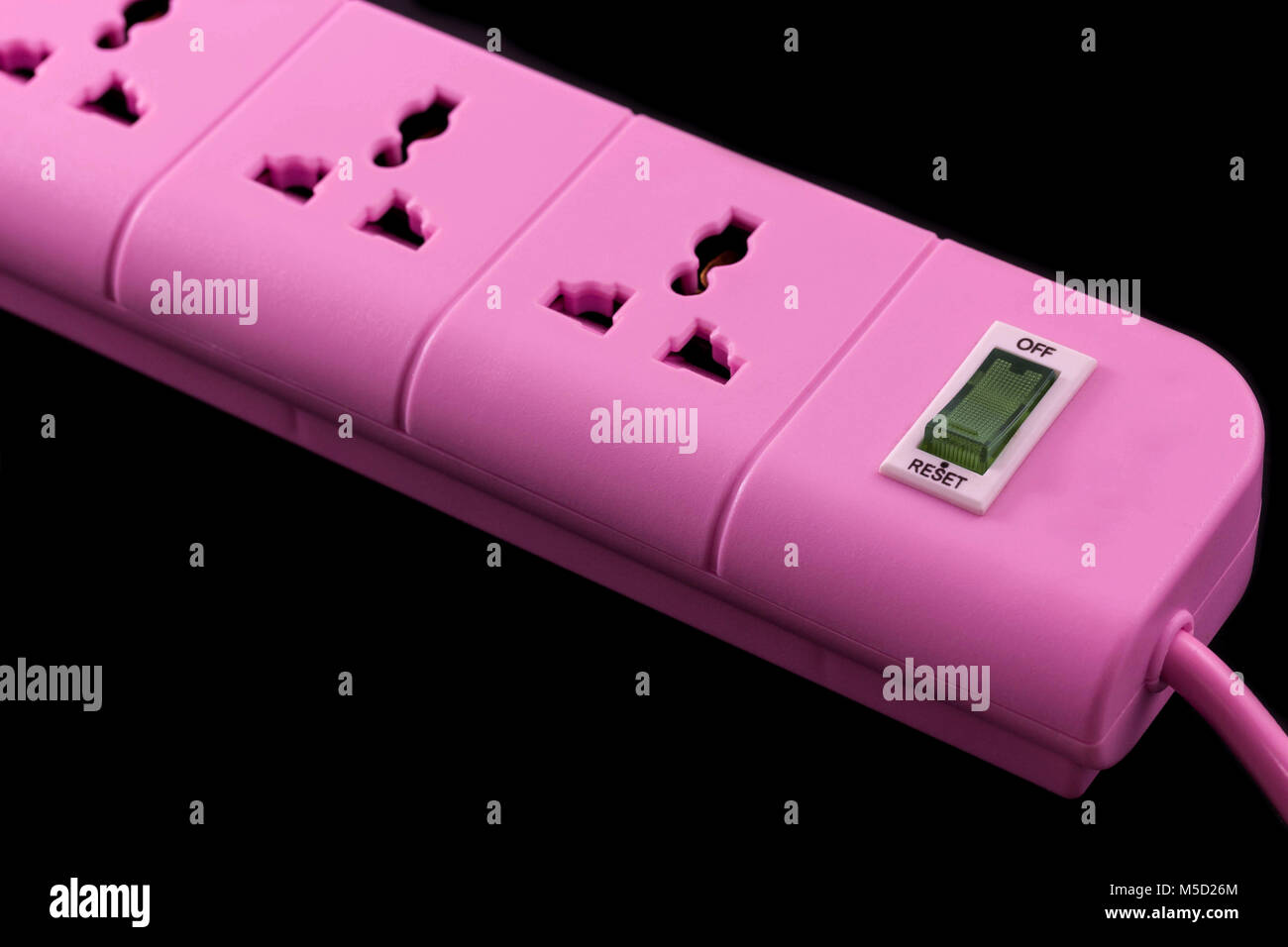Closeup picture of a pink outlet isolated on black. Electric Power Line ...