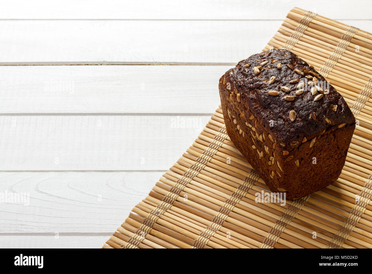 Traditional rye bread with seeds, baked in brick oven. Healthy and full ...
