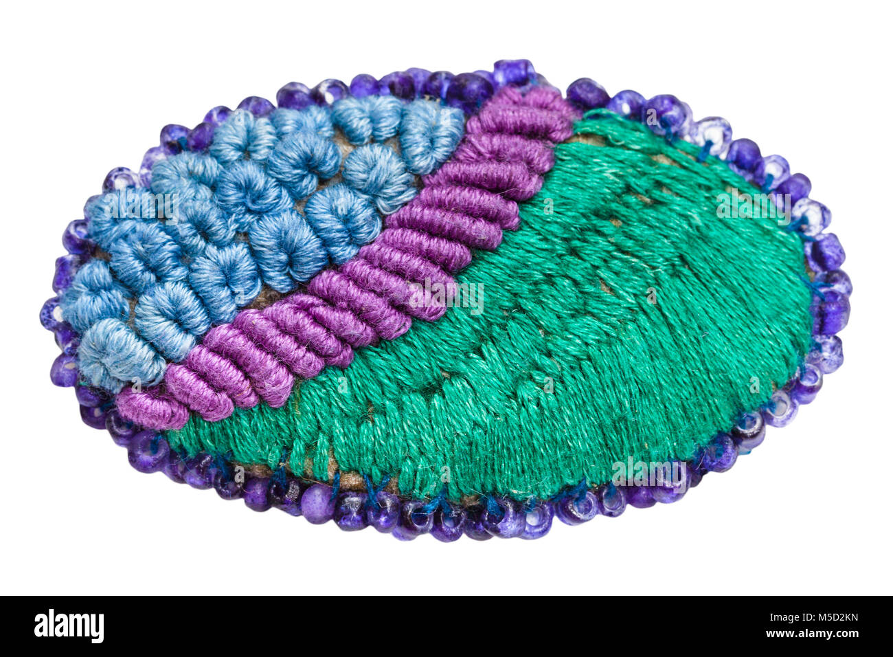 hand made knitted brooch isolated on white background Stock Photo - Alamy