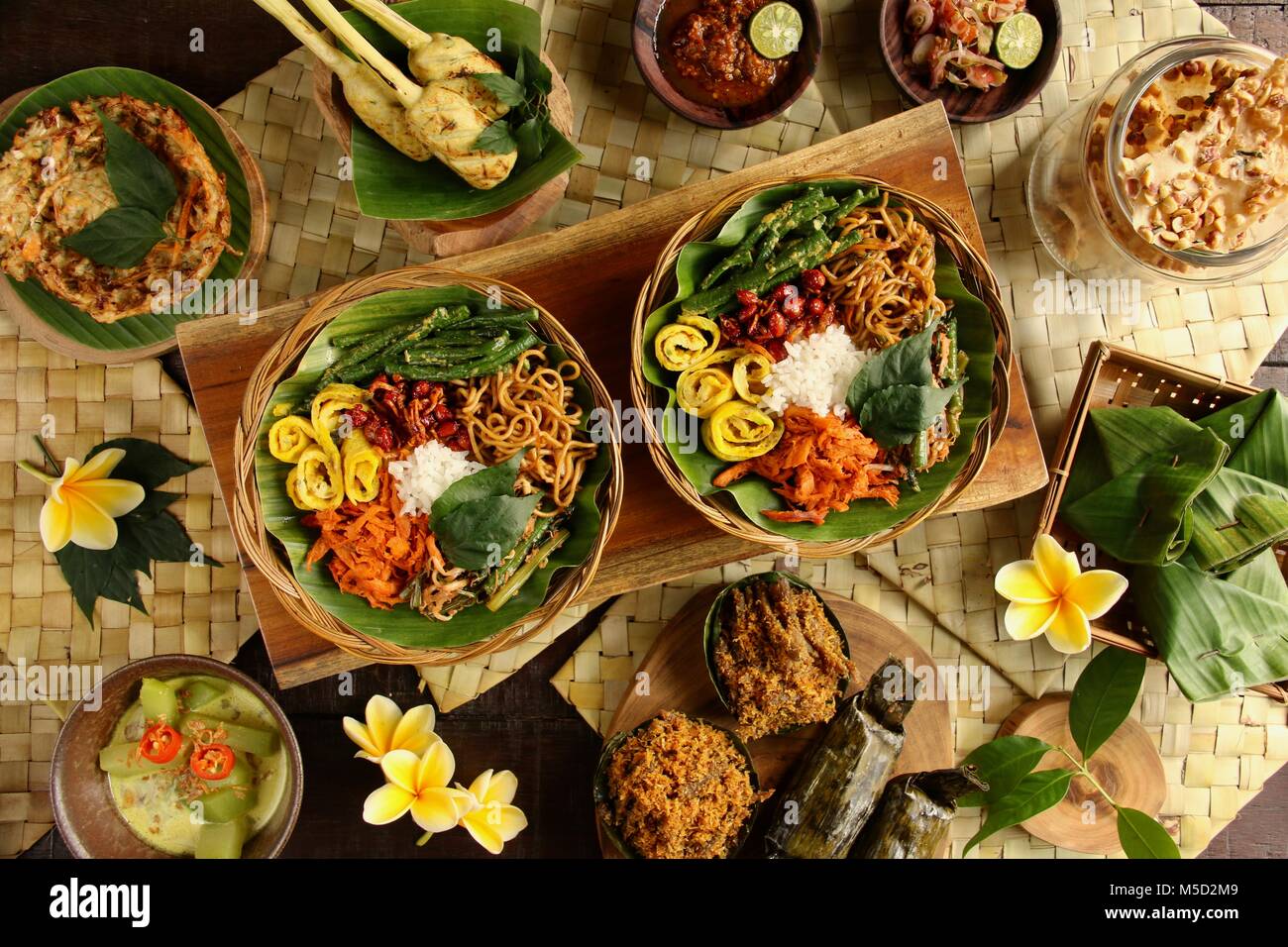 Nasi Campur Bali. Popular traditional Balinese dish of steamed rice ...