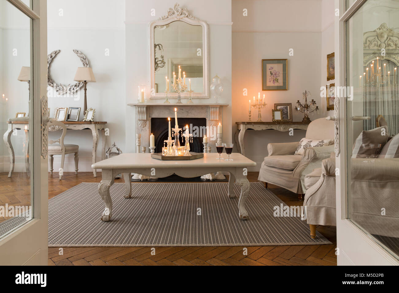 Candlelit luxury home showcase interior living room with fireplace ...