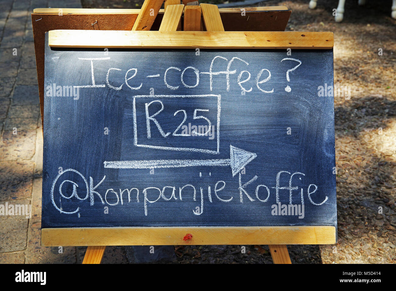 Blackboard sign for iced coffee on a hot, summer's day in the ...