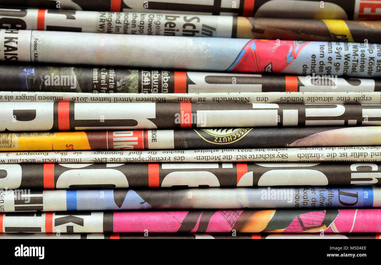Different daily newspapers on one pile Stock Photo - Alamy