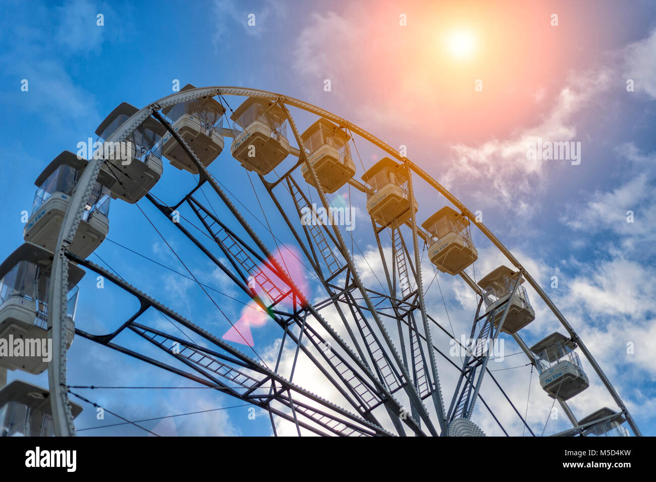 giant ferris wheel at an amusement park Stock Photo - Alamy