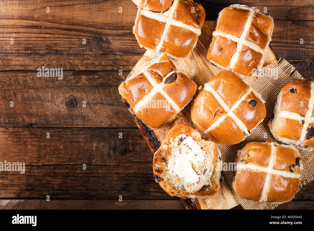Easter Breakfast with Hot Cross Buns, served on Wooden Chopping Board ...