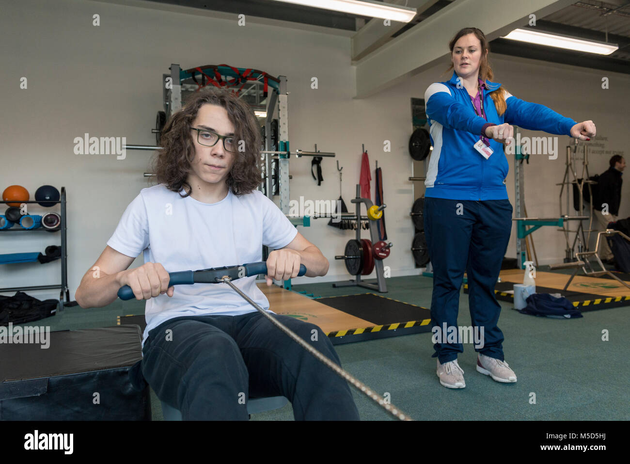 students work out and train in a gym during a lesson at college Stock ...