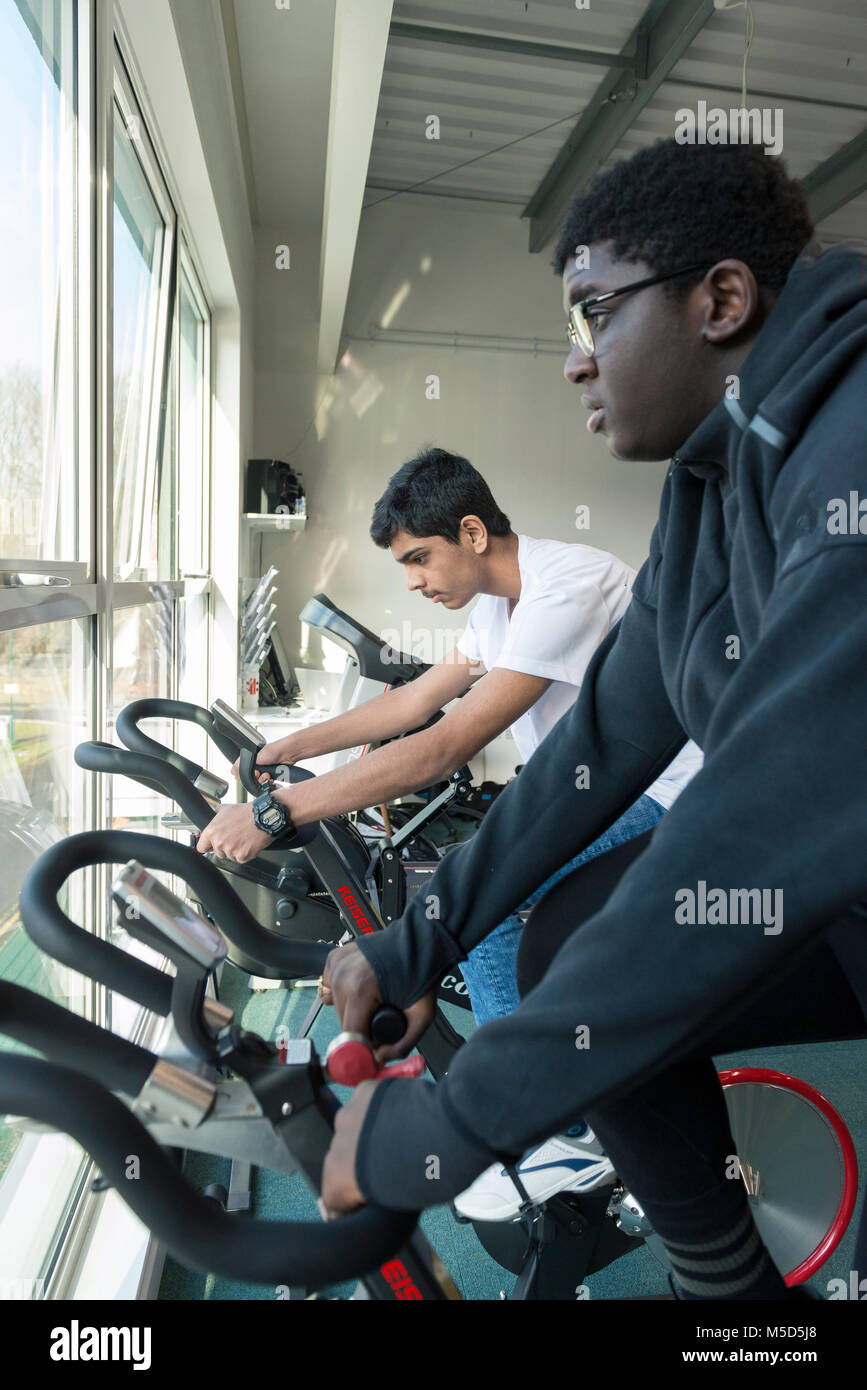 students work out and train in a gym during a lesson at college Stock ...