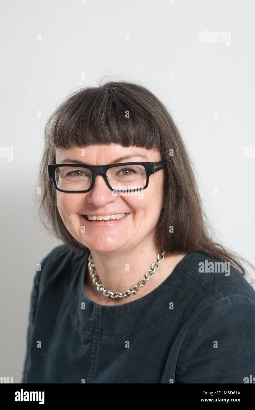 a confident happy writer and author has their portrait taken Stock ...