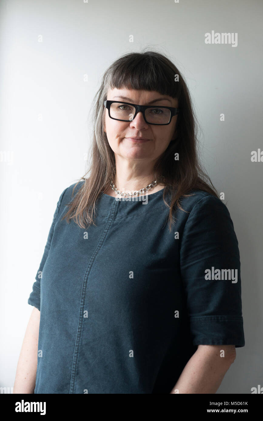 a confident happy writer and author has their portrait taken Stock ...