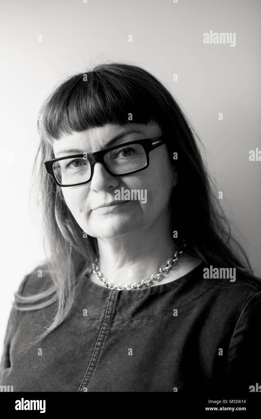 a confident happy writer and author has their portrait taken Stock ...