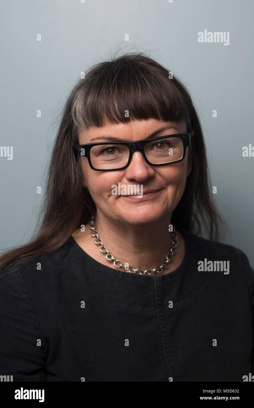 a confident happy writer and author has their portrait taken Stock ...