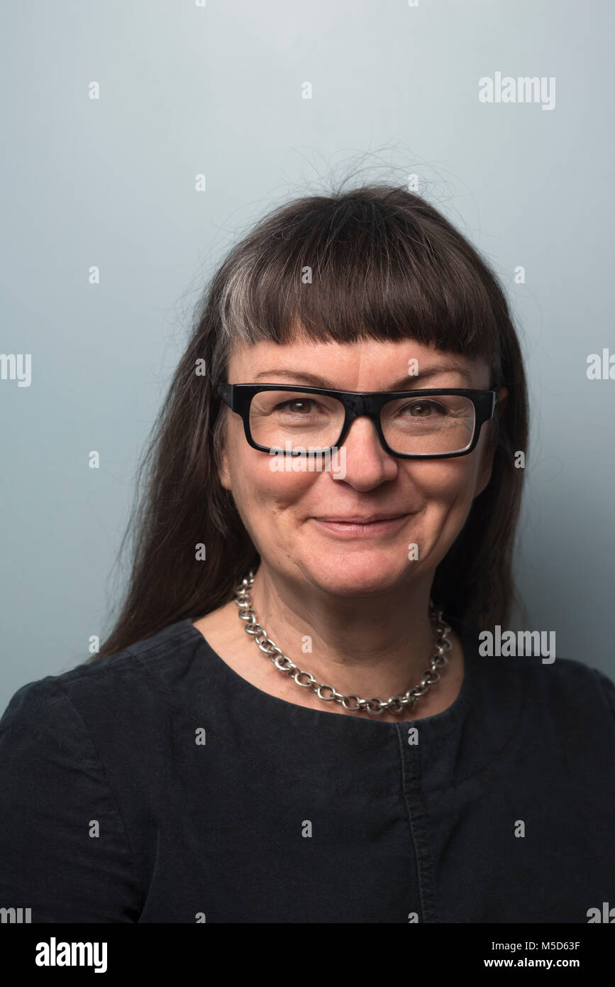 a confident happy writer and author has their portrait taken Stock ...