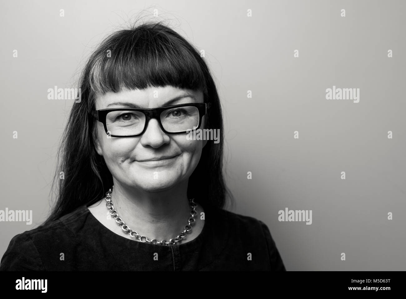 a confident happy writer and author has their portrait taken Stock ...