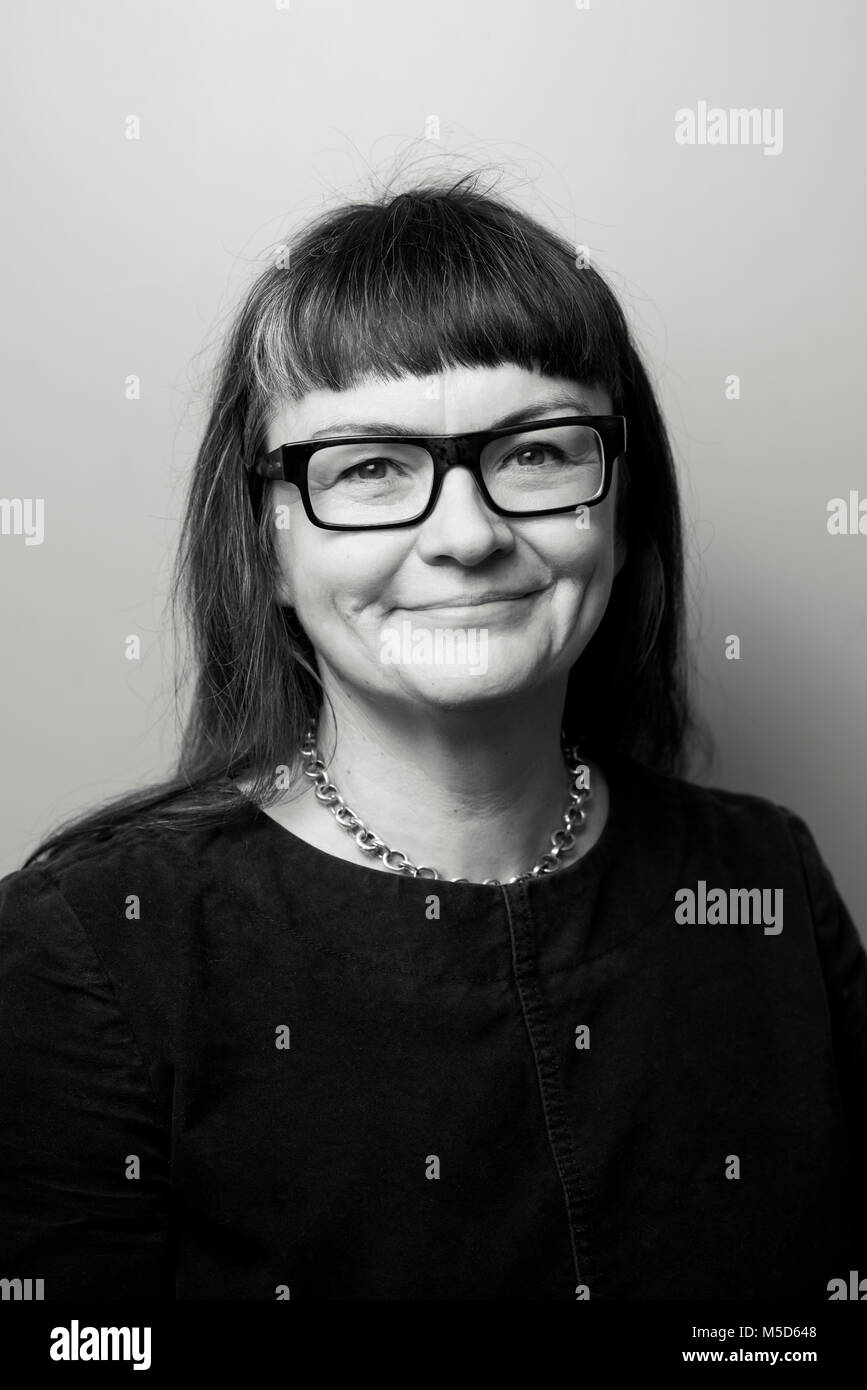 a confident happy writer and author has their portrait taken Stock ...