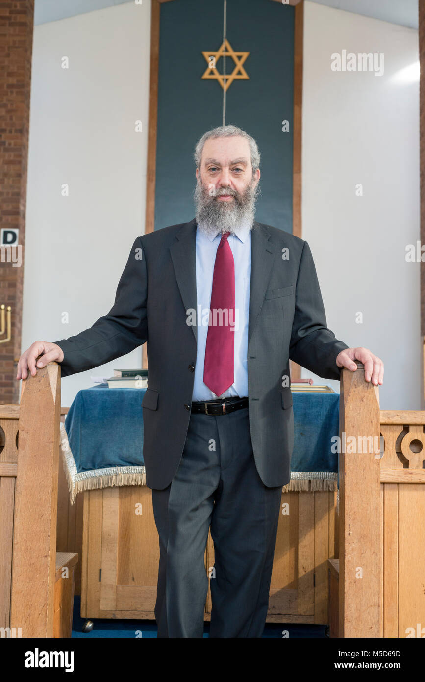 a rabbi stands in a synagogue for a portrait Stock Photo - Alamy