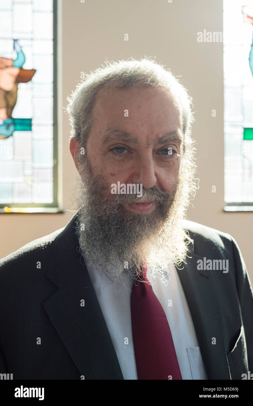 a rabbi stands in a synagogue for a portrait Stock Photo - Alamy