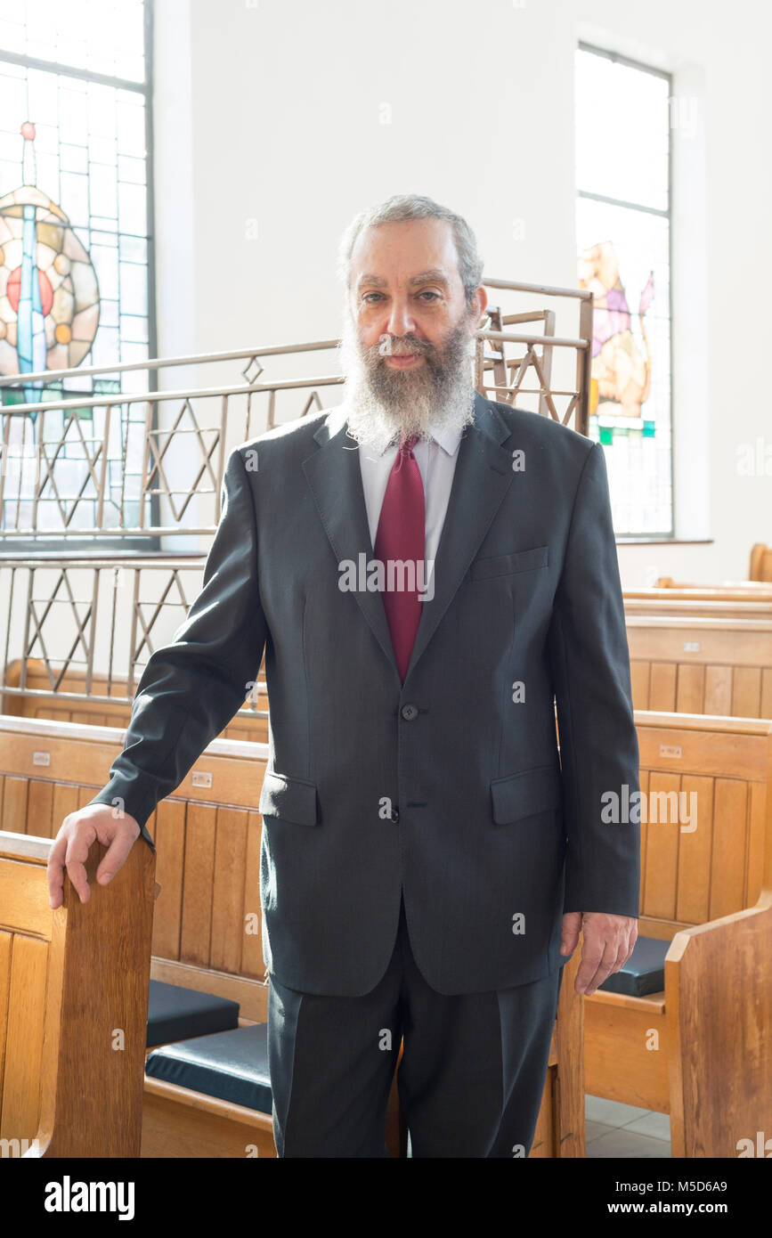 a rabbi stands in a synagogue for a portrait Stock Photo - Alamy