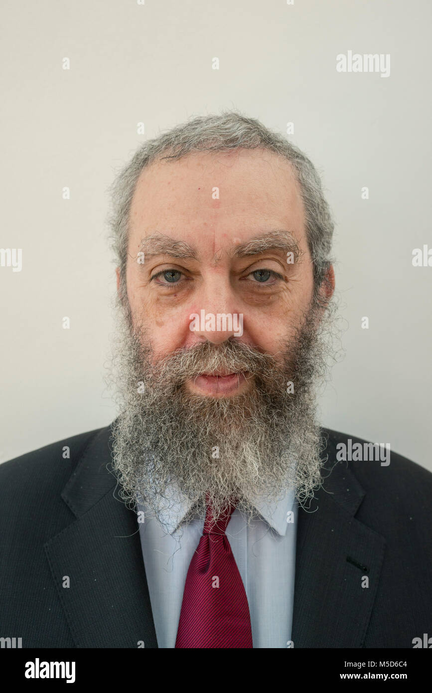 a rabbi stands in a synagogue for a portrait Stock Photo - Alamy