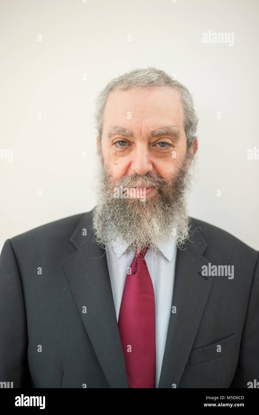 a rabbi stands in a synagogue for a portrait Stock Photo - Alamy