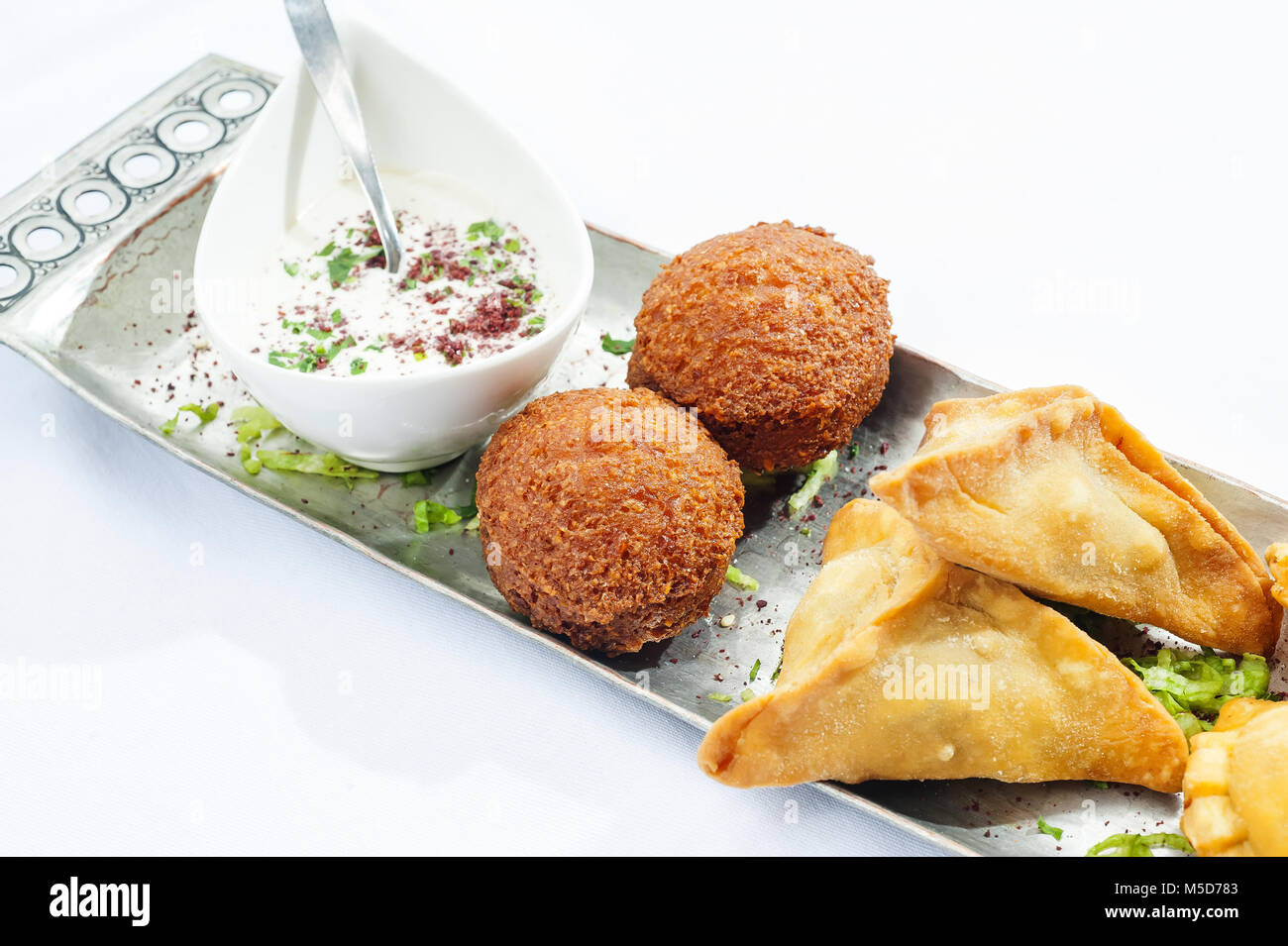 Lebanese Food of Fried Kibe Isolated on white Stock Photo - Alamy