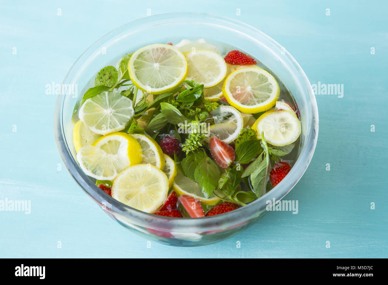 Infused water with fresh organic fruits Stock Photo - Alamy