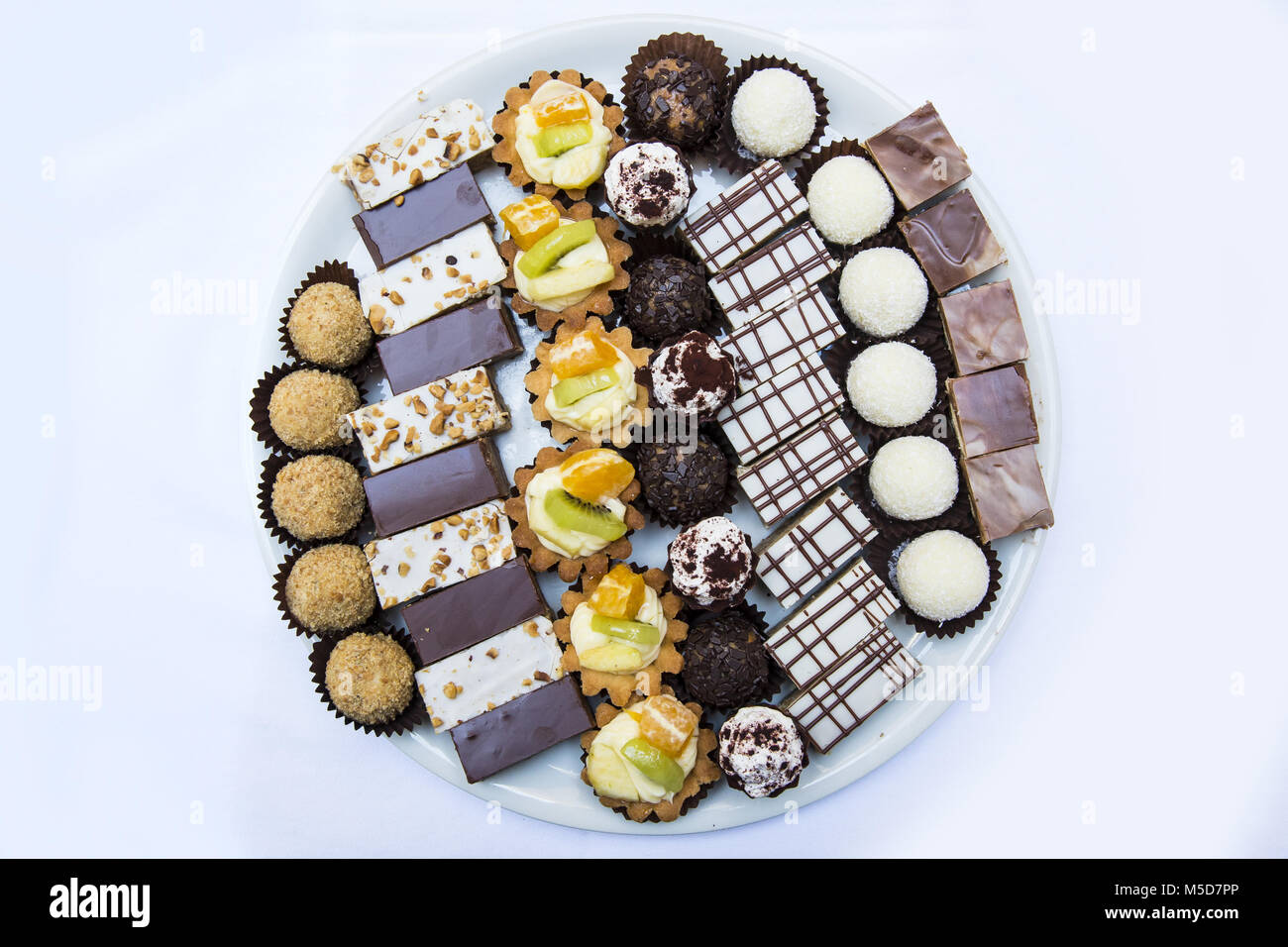 lot of different sweets on the table Stock Photo - Alamy