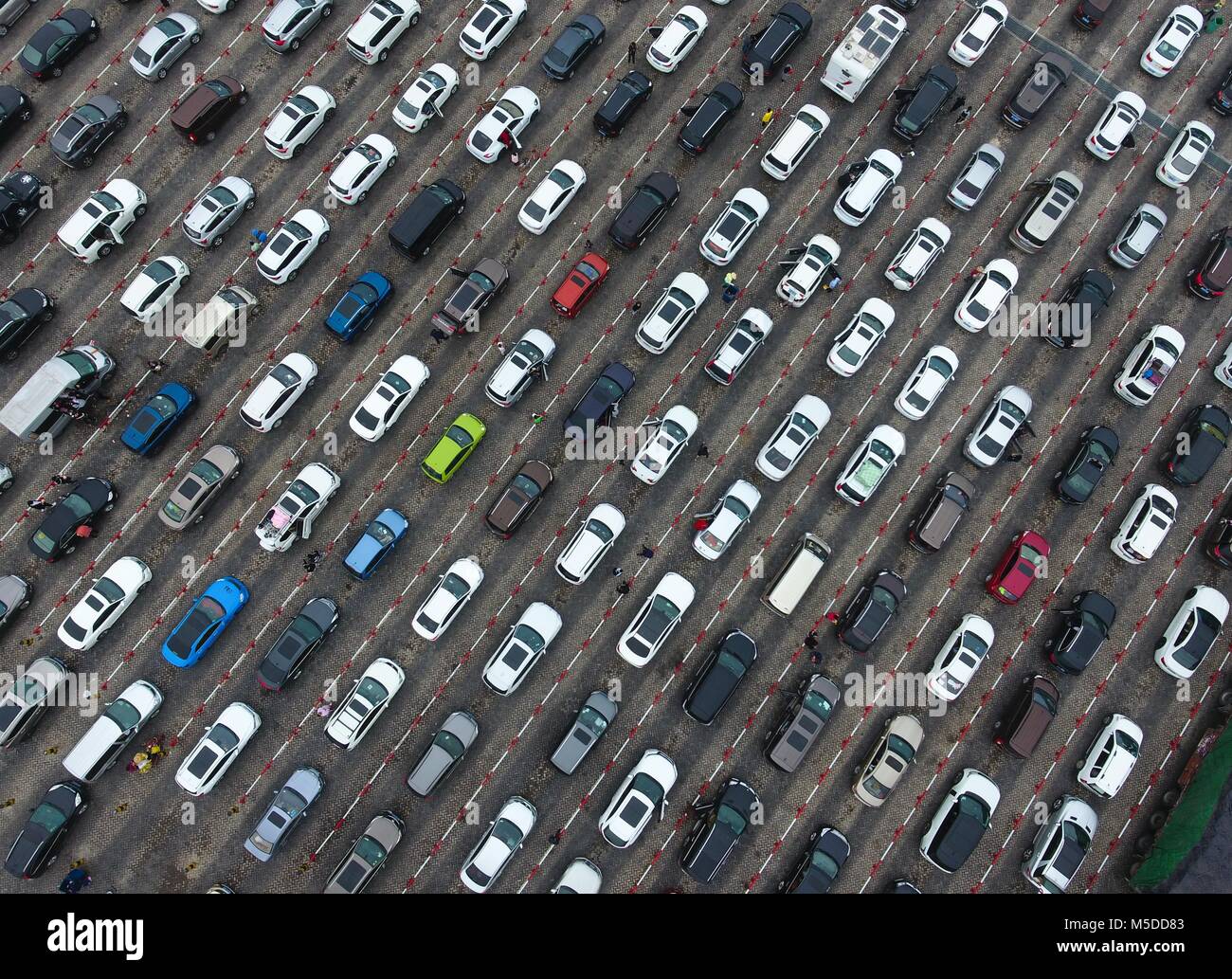 Haikou, China's Hainan Province. 22nd Feb, 2018. Vehicles wait at ...