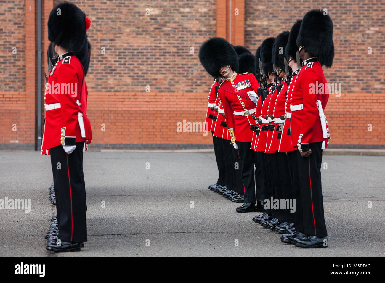 Windsor, UK. 21st February, 2018. An officer inspects the 1st Battalion ...