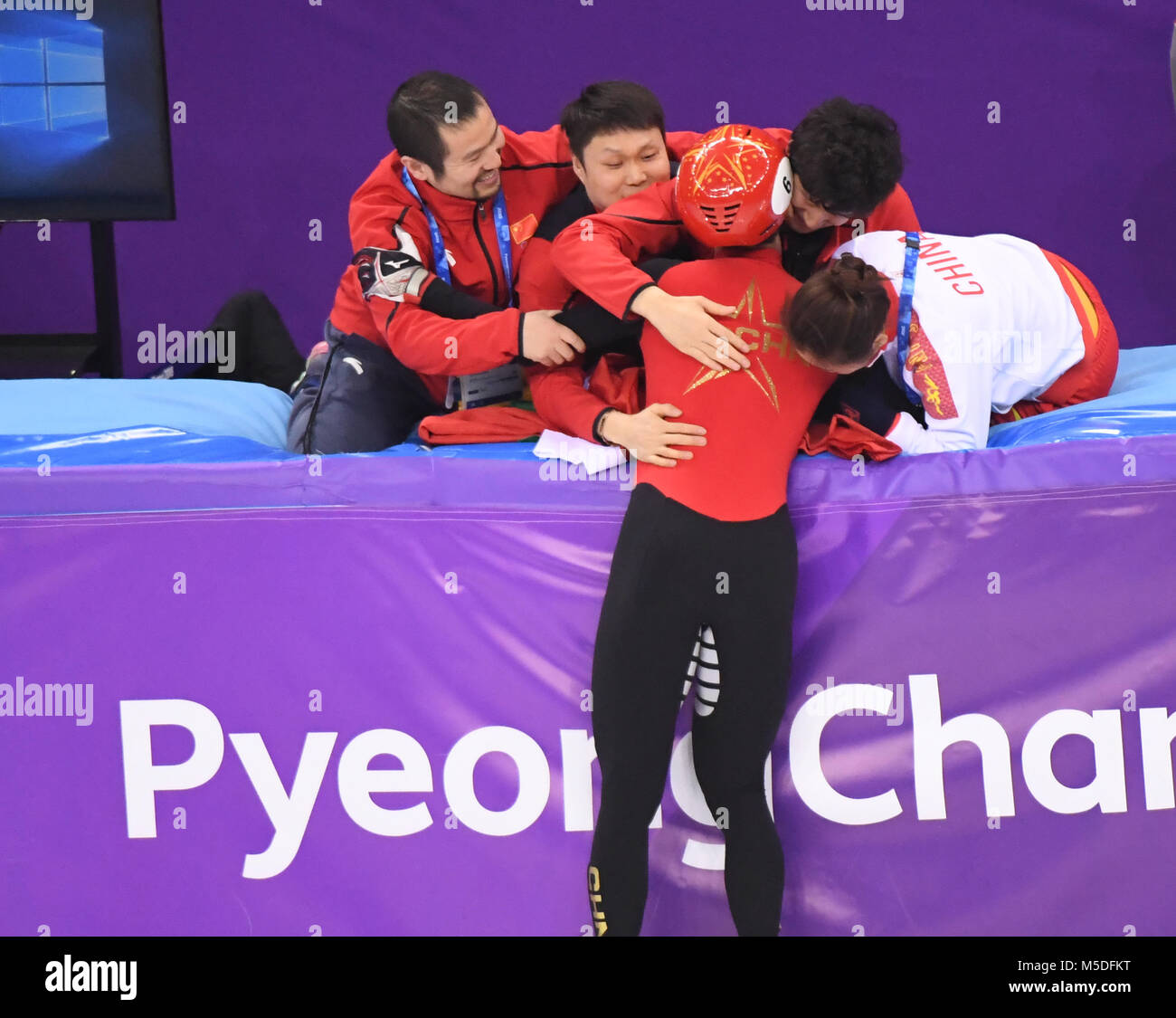 Pyeongchang, South Korea. 22nd Feb, 2018. Wu Dajing (C) of China ...