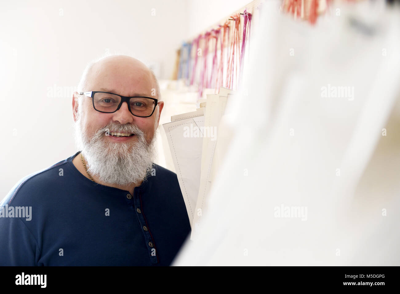 Businessman Ivo Tichy poses with materials for his brand products Don ...