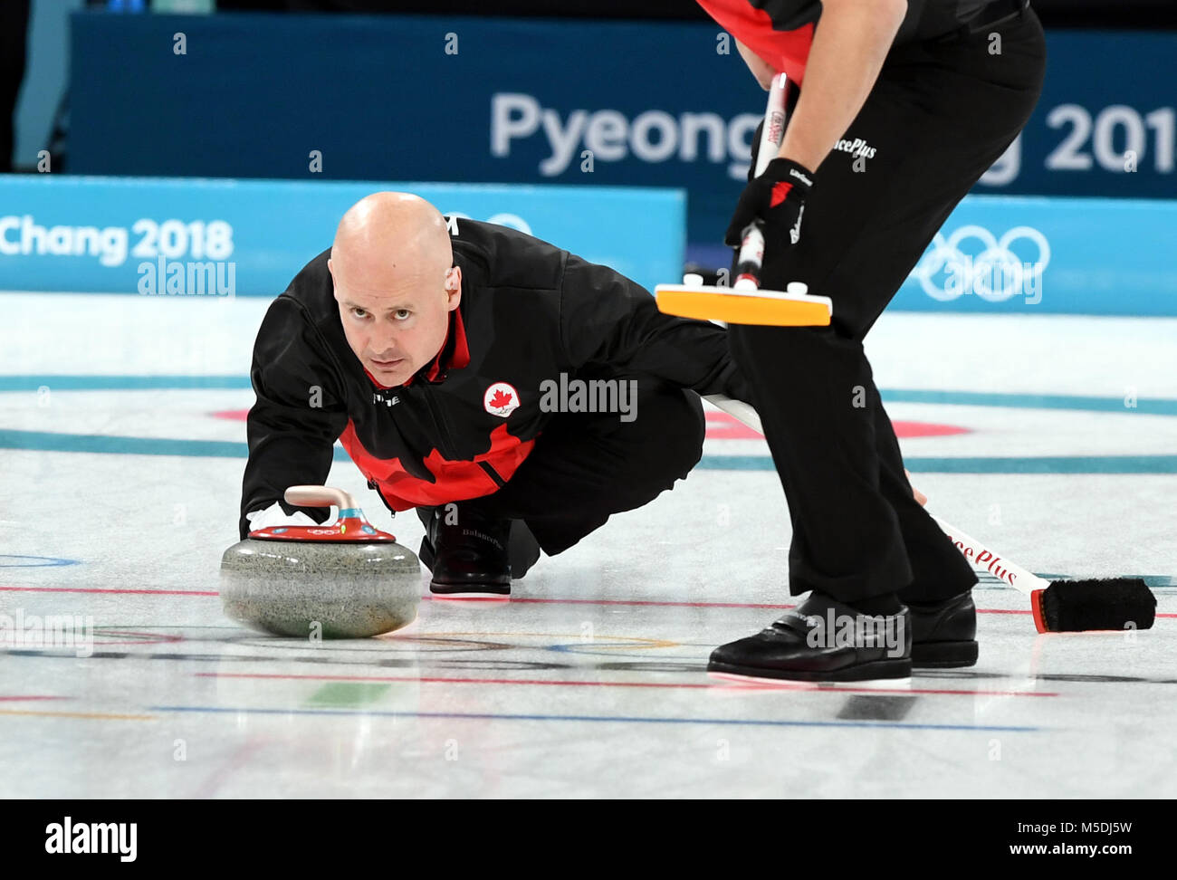 Pyeongchang, South Korea. 22nd Feb, 2018. Kevin Koe of Canada competes ...