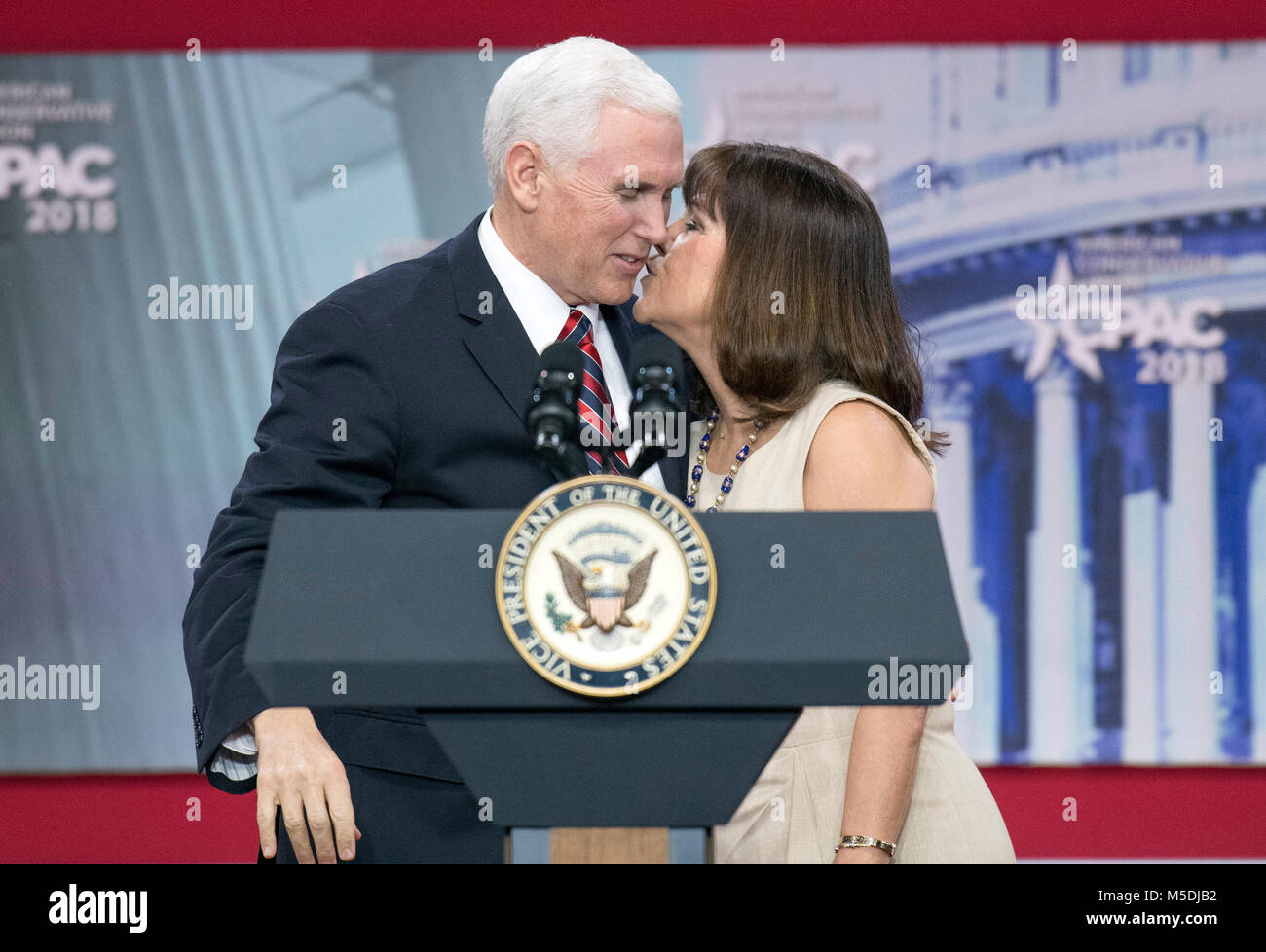 United States Vice President Mike Pence receives a kiss from his wife ...