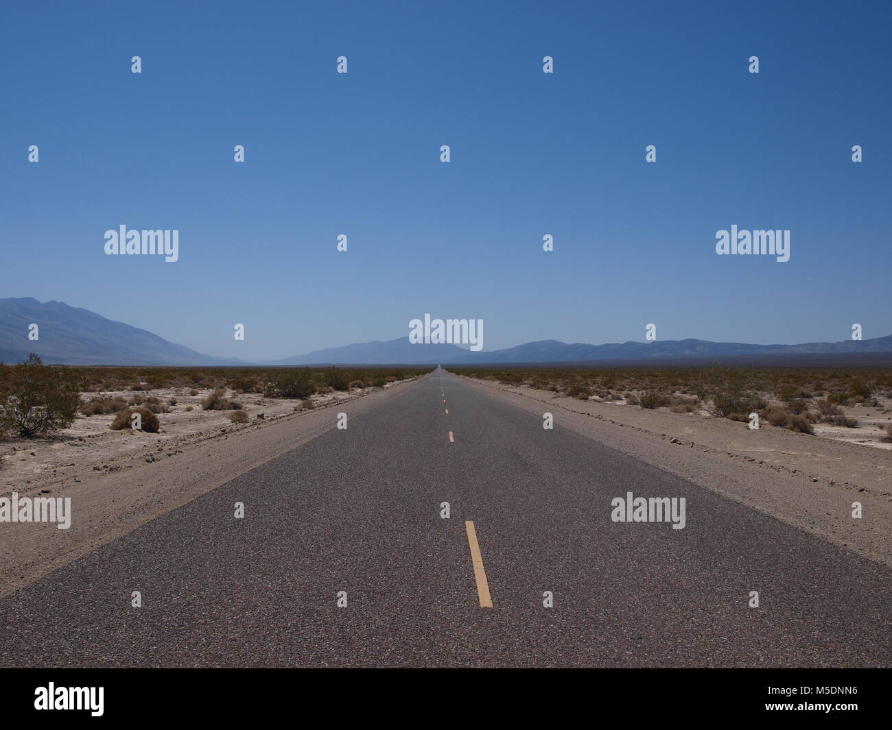 Empty road, Death Valley Stock Photo - Alamy