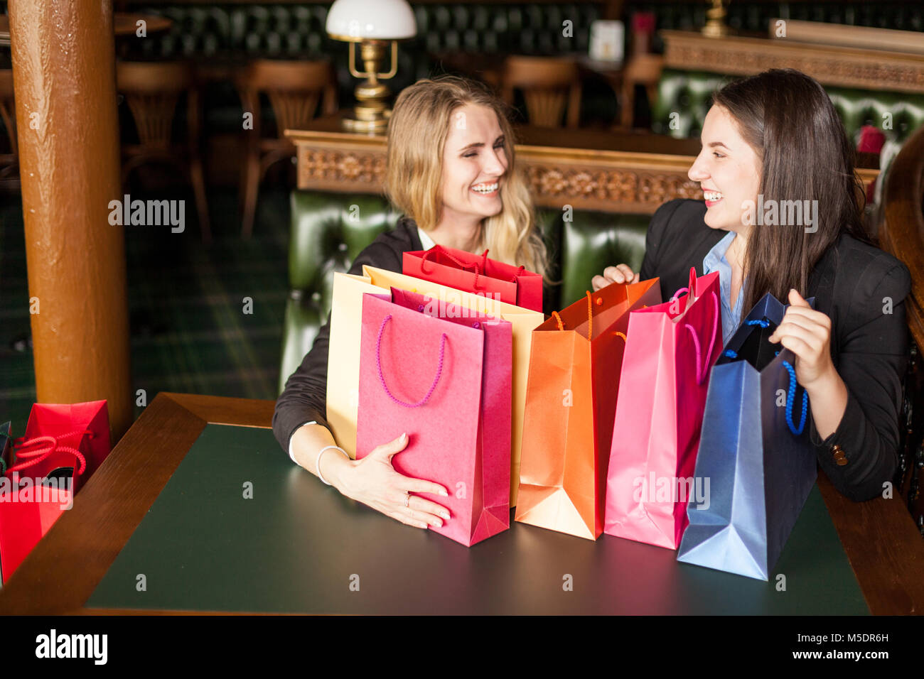 Tourists Having Good Time While Spending Money In A Shop Stock Photo tourists-having-good-time-while-spending-money-in-a-shop-stock-photo