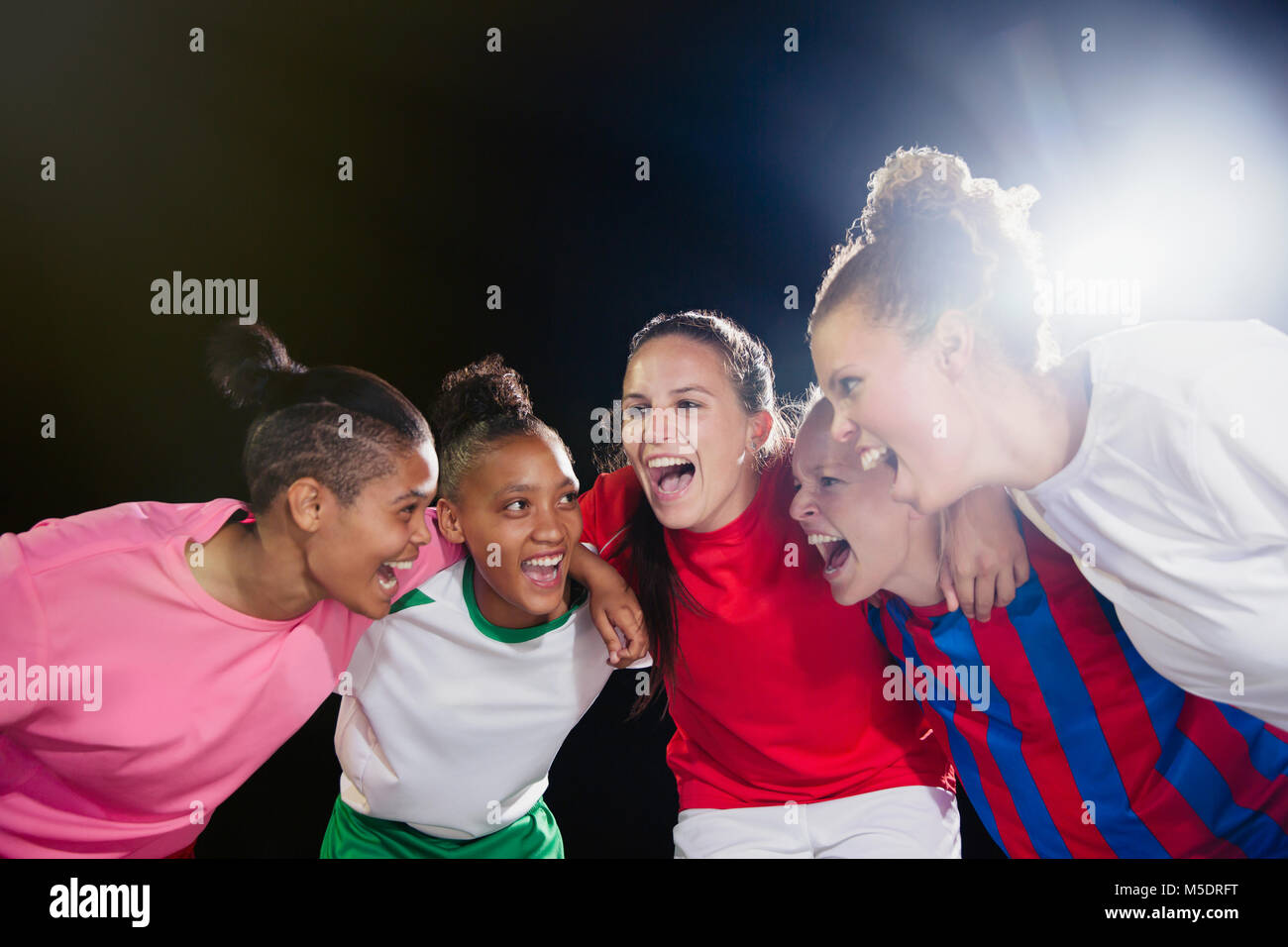 Team hugging huddling hi-res stock photography and images - Alamy
