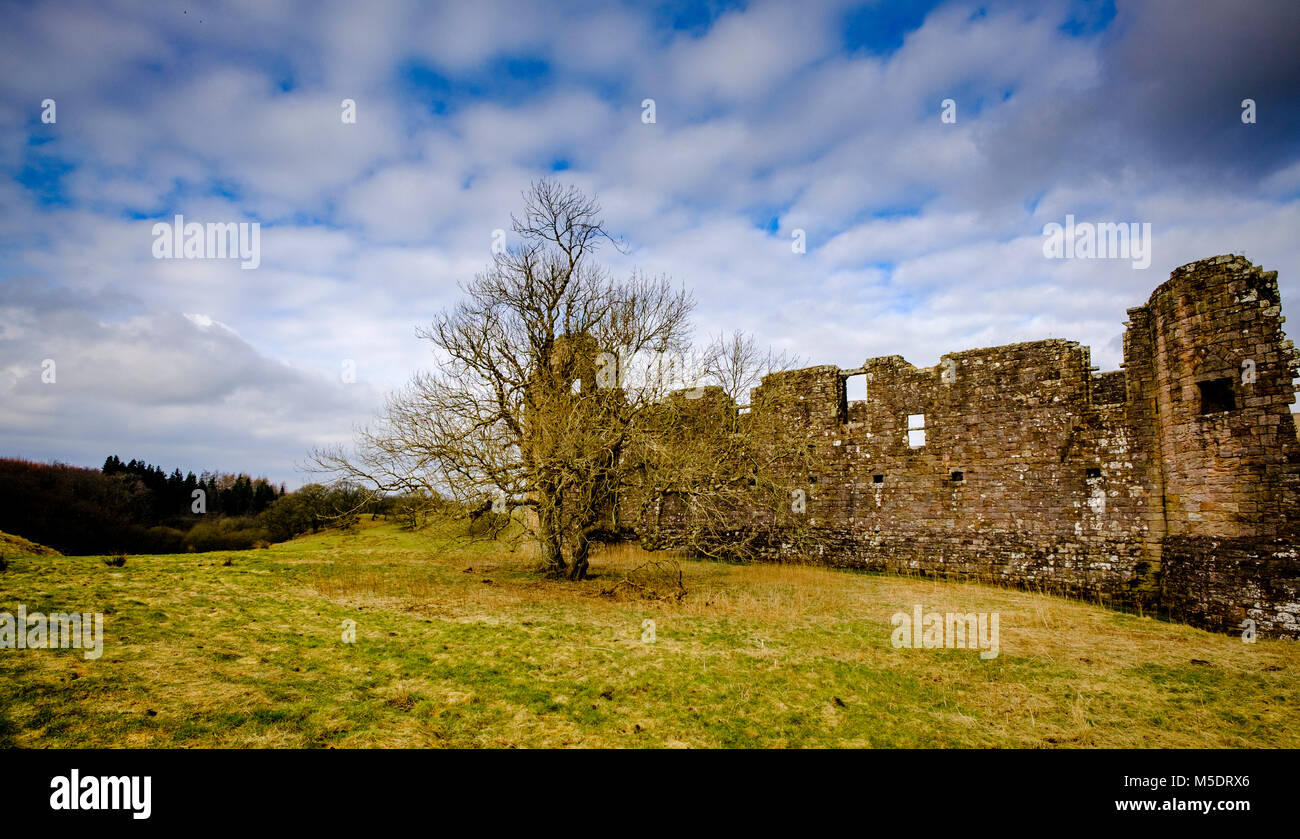 Morton Castle is located by an artificial loch in the hills above ...