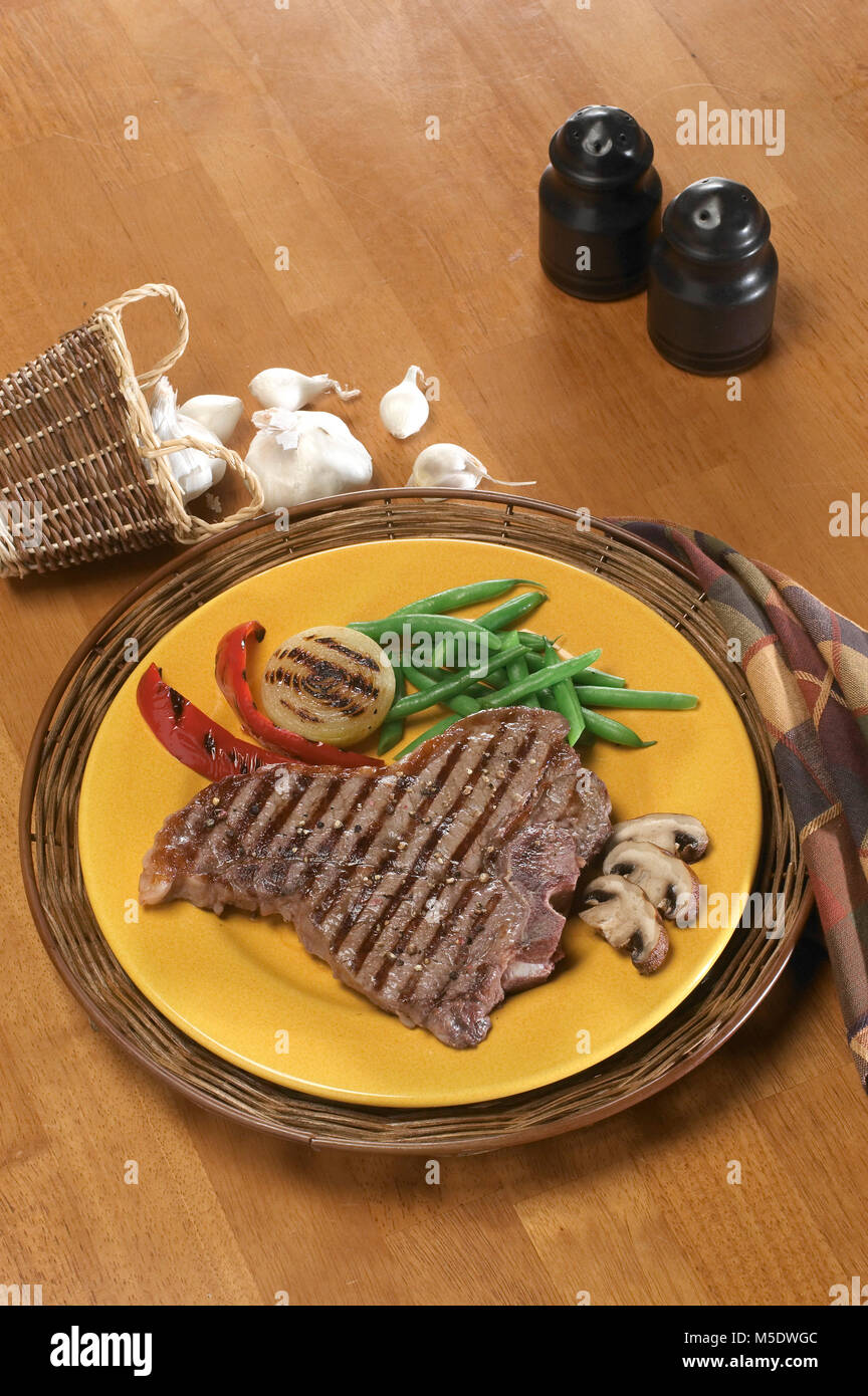Grilled Porterhouse Steak On Plate Stock Photo - Alamy