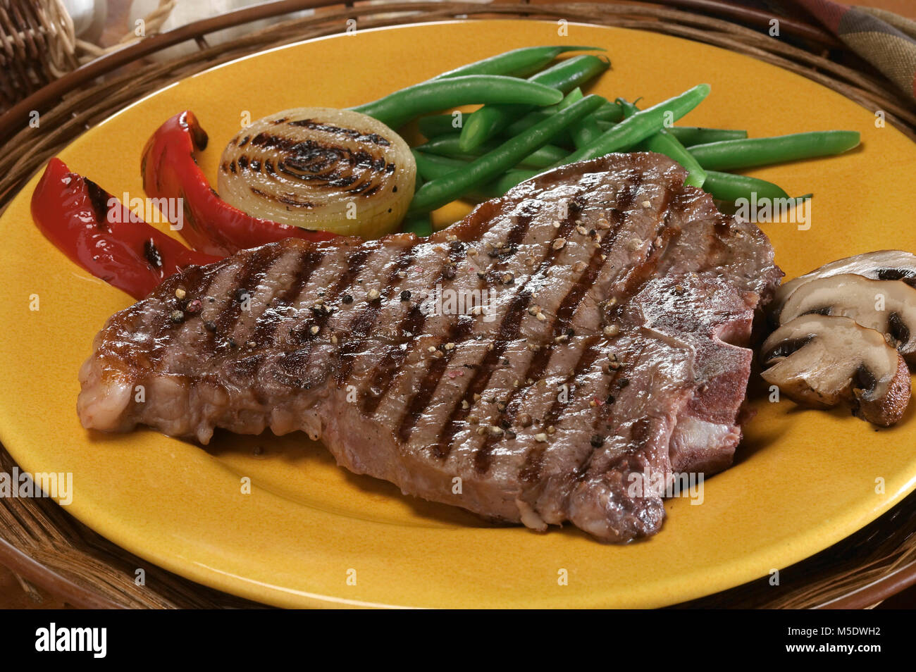 Grilled Porterhouse Steak On Plate Stock Photo - Alamy