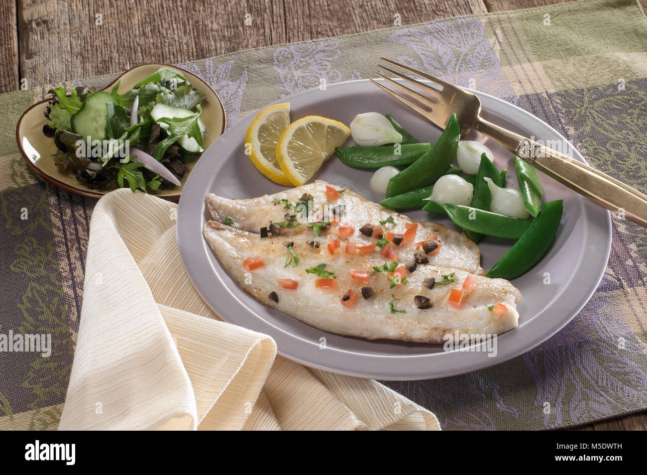 Talapia Tilapia Fillet On Plate Stock Photo - Alamy