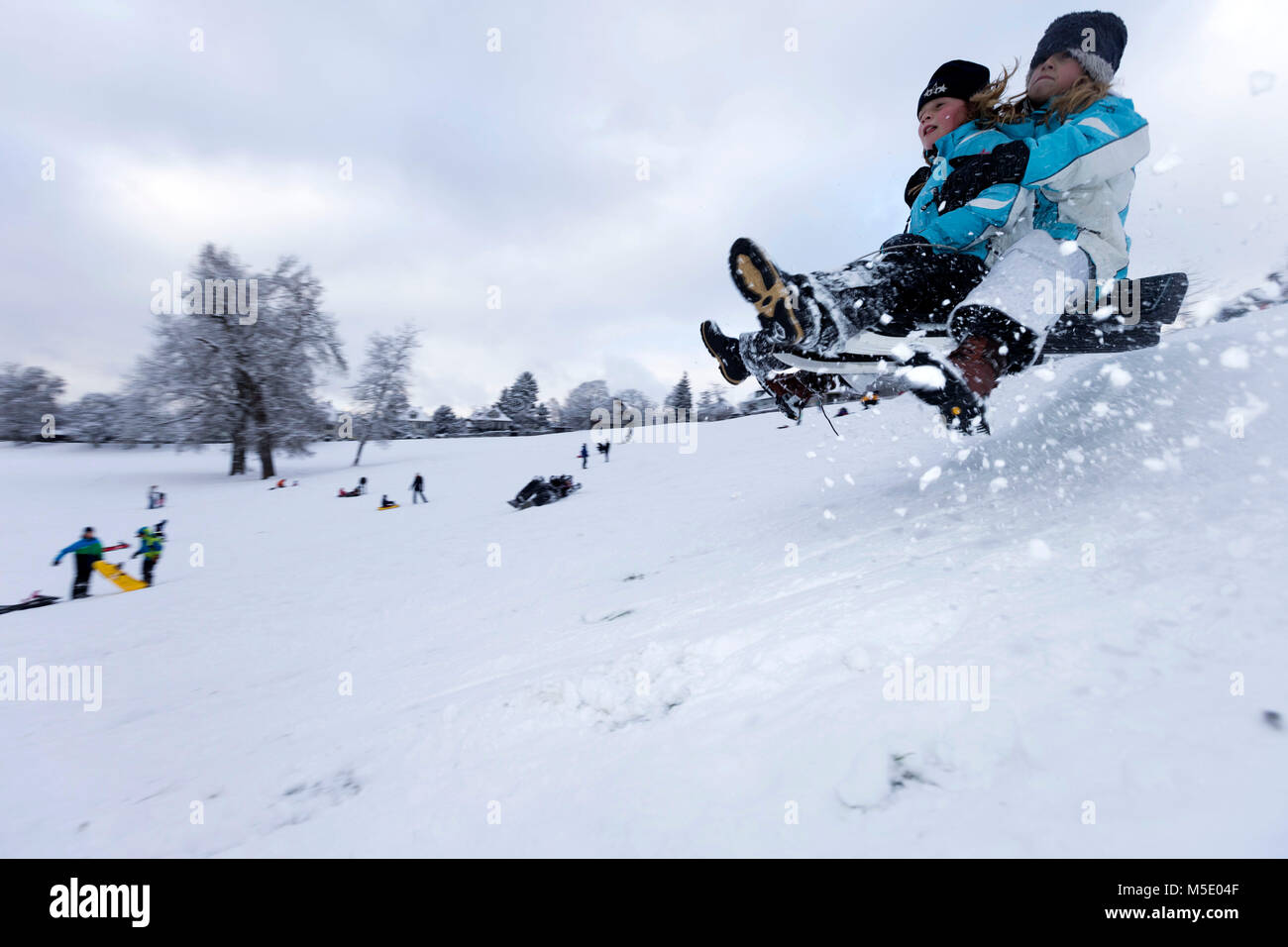 Sleigh riding children hi-res stock photography and images - Alamy